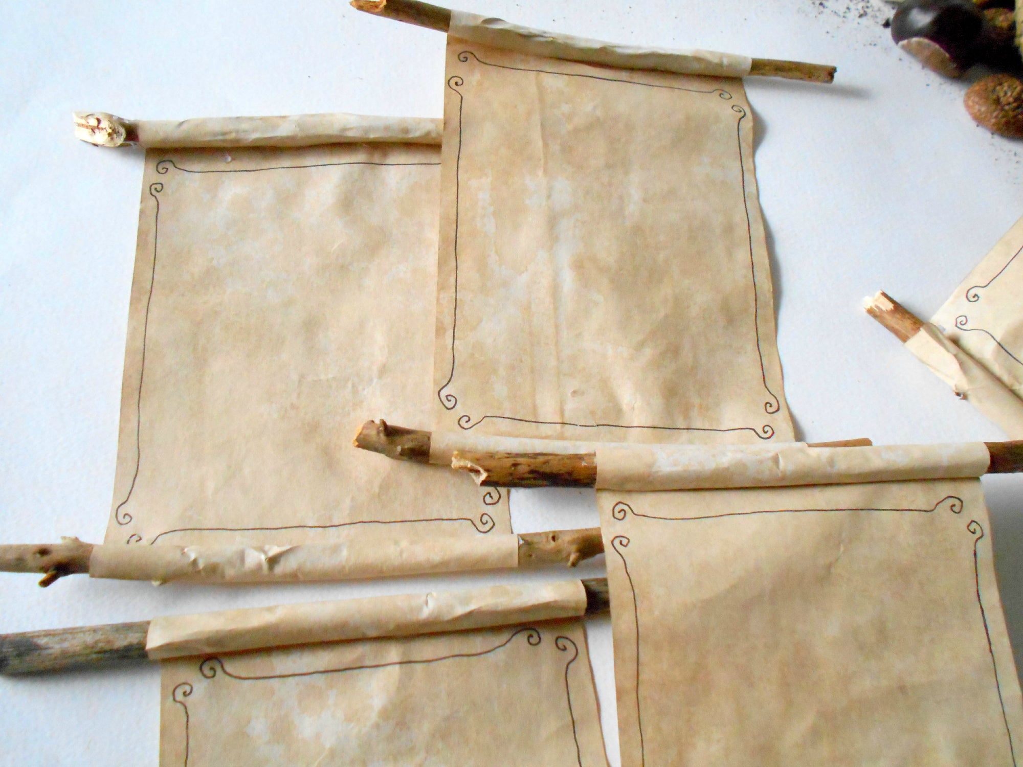 20 Paper scrolls with coffee recycled papers and hand-drawn templates ...