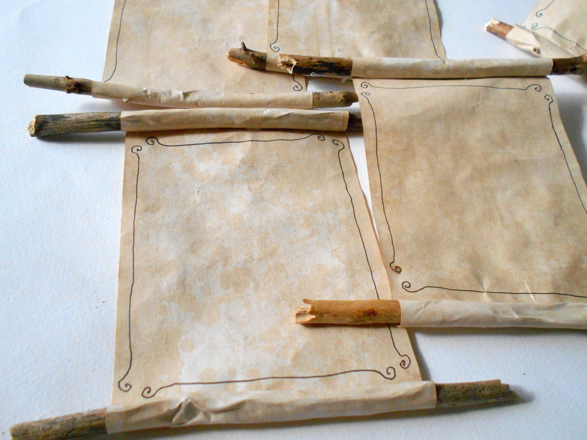 20 Paper scrolls with coffee recycled papers and hand-drawn templates ...